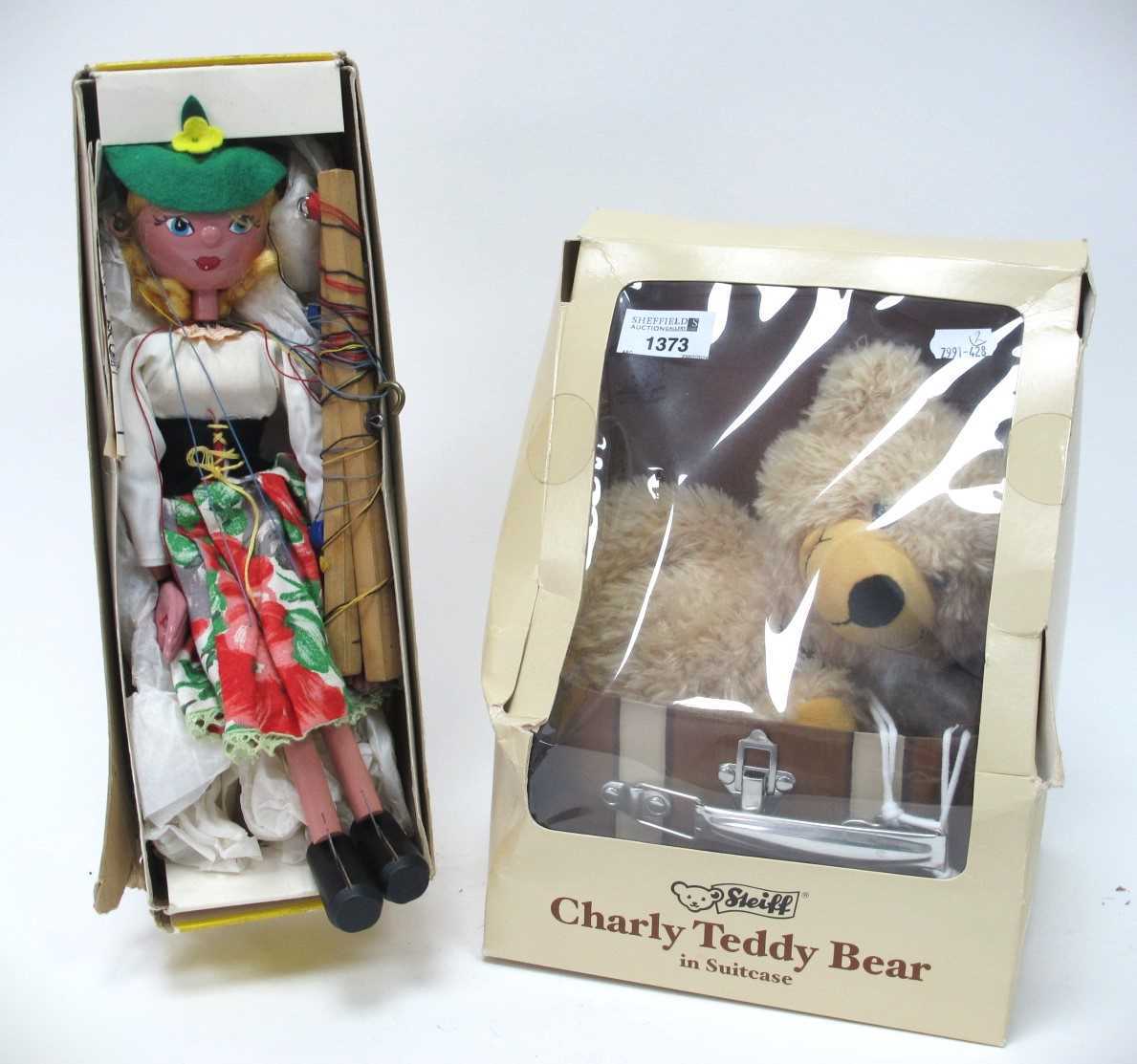 Lot 1373 - A Steiff 'Charley teddy bear in suitcase'
