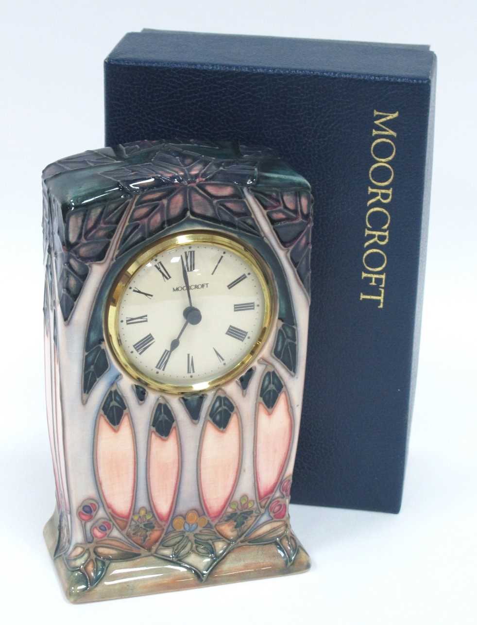 Lot 1109 - A Moorcroft Pottery Mantel Clock, in the