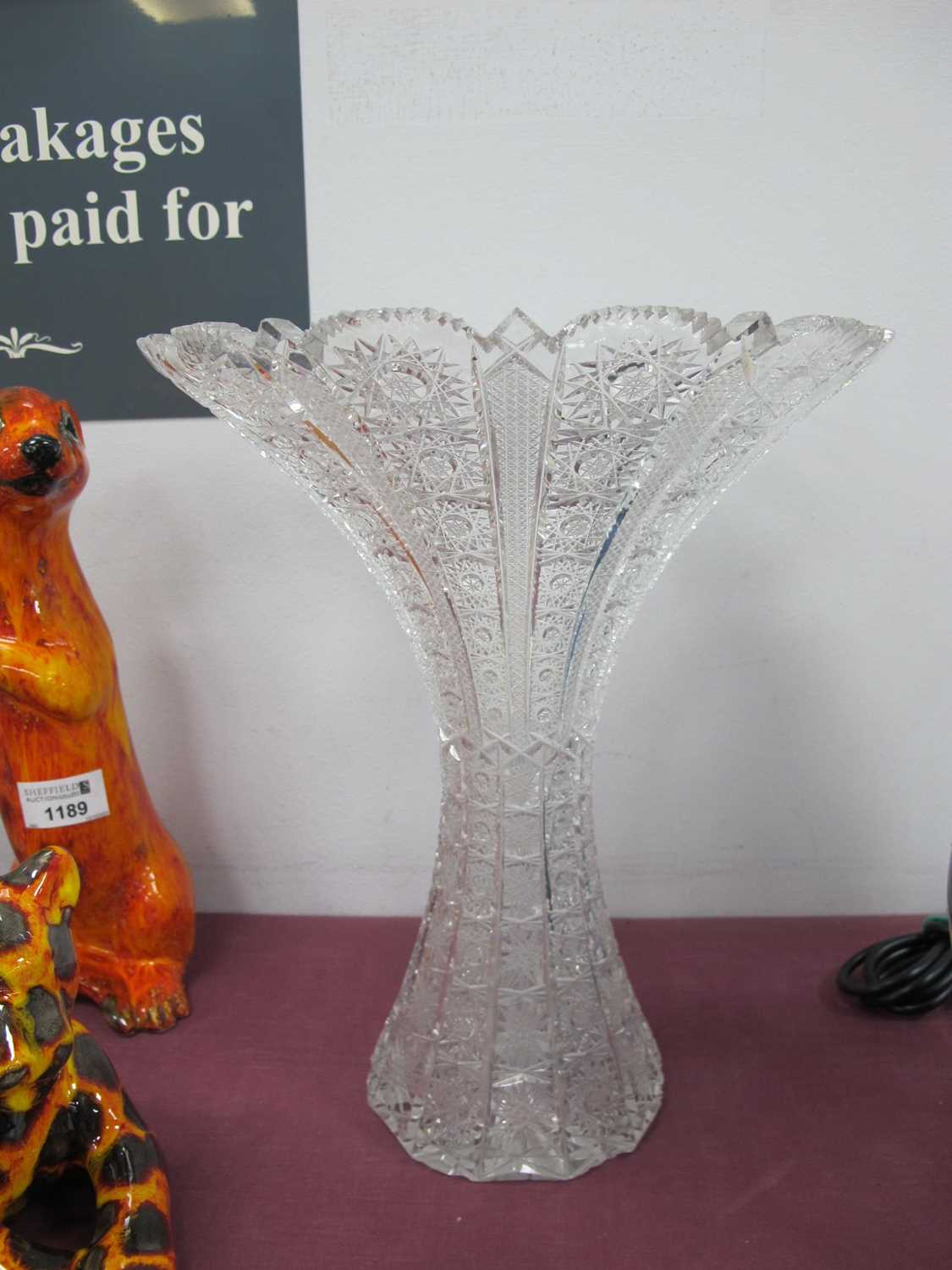 Lot 1187 - A waisted glass vase with a wavy rim and