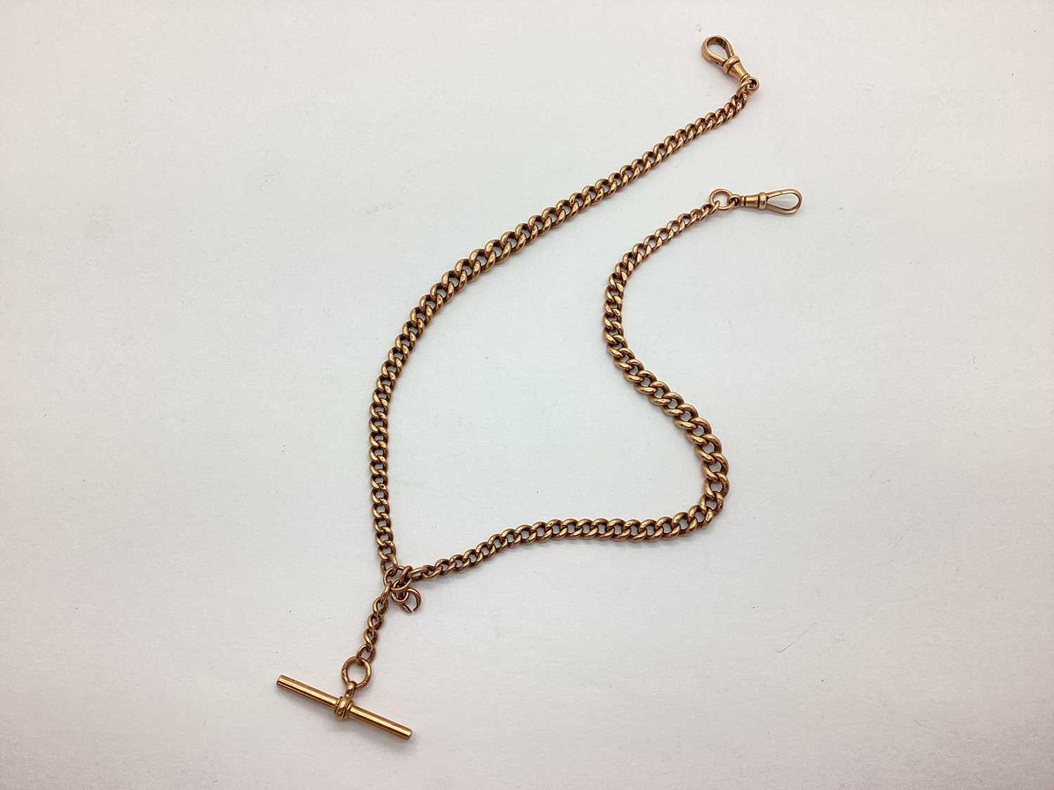 Lot 123 - A Graduated Curb Link Double Albert Chain,
