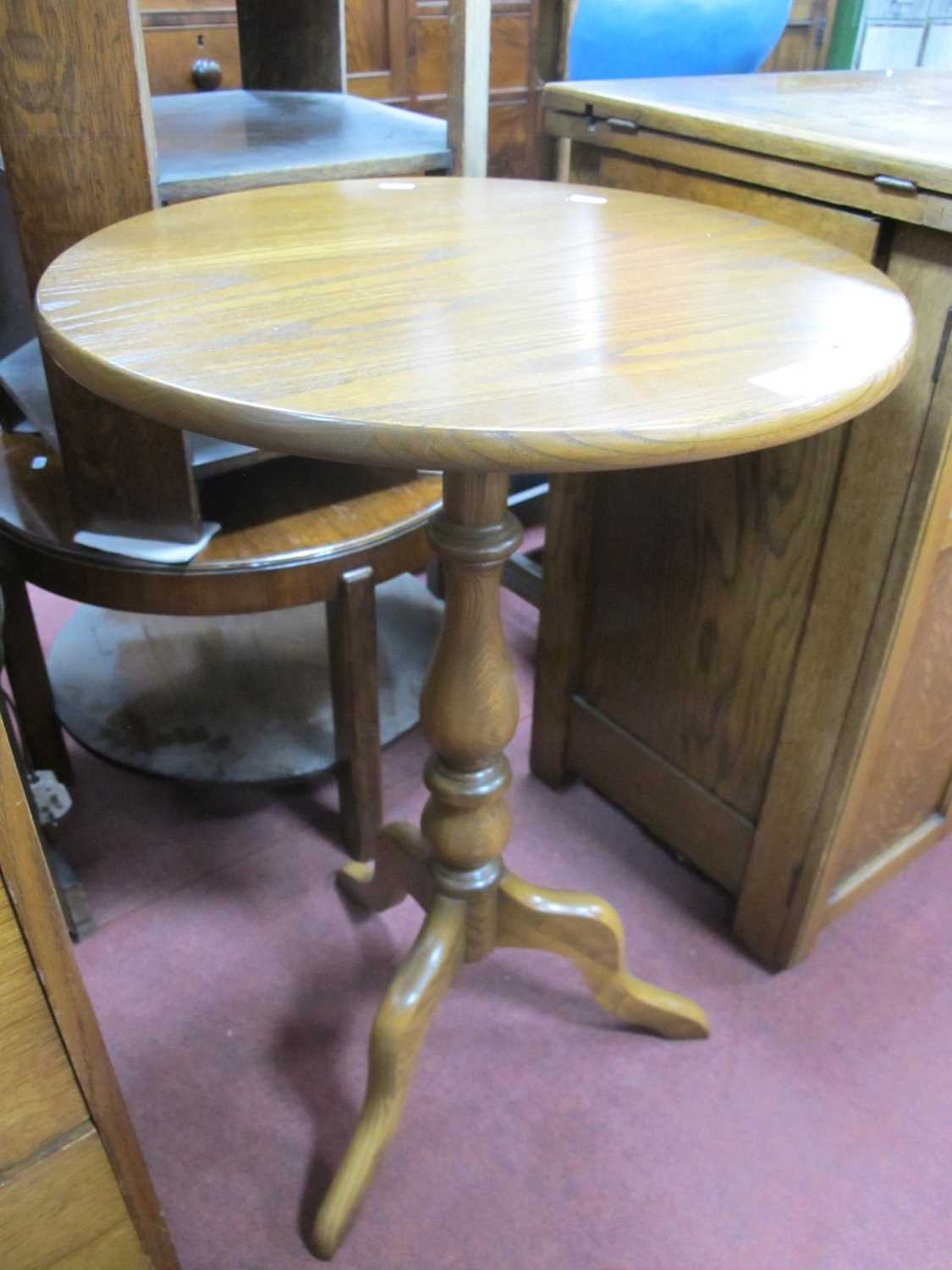 Lot 1560 - Ercol Pedestal Table, with a circular top,