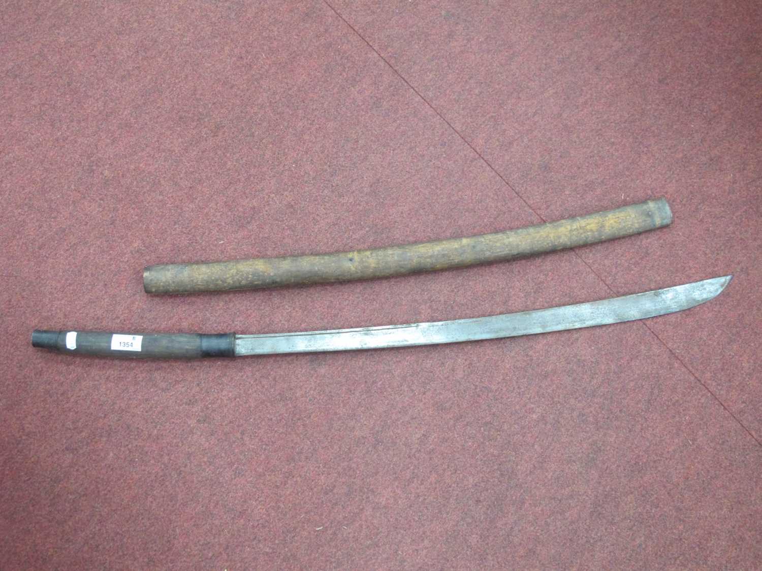 Lot 1354 - Eastern? Sword with a curved blade, wooden