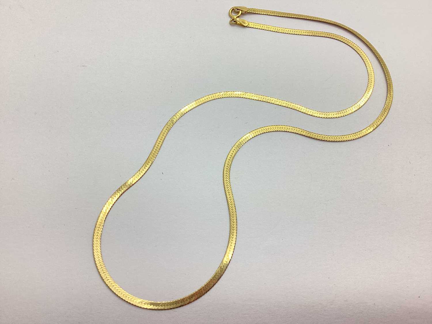 Lot 213 - A 9ct Gold Flat Snake Link Necklace, 45cm