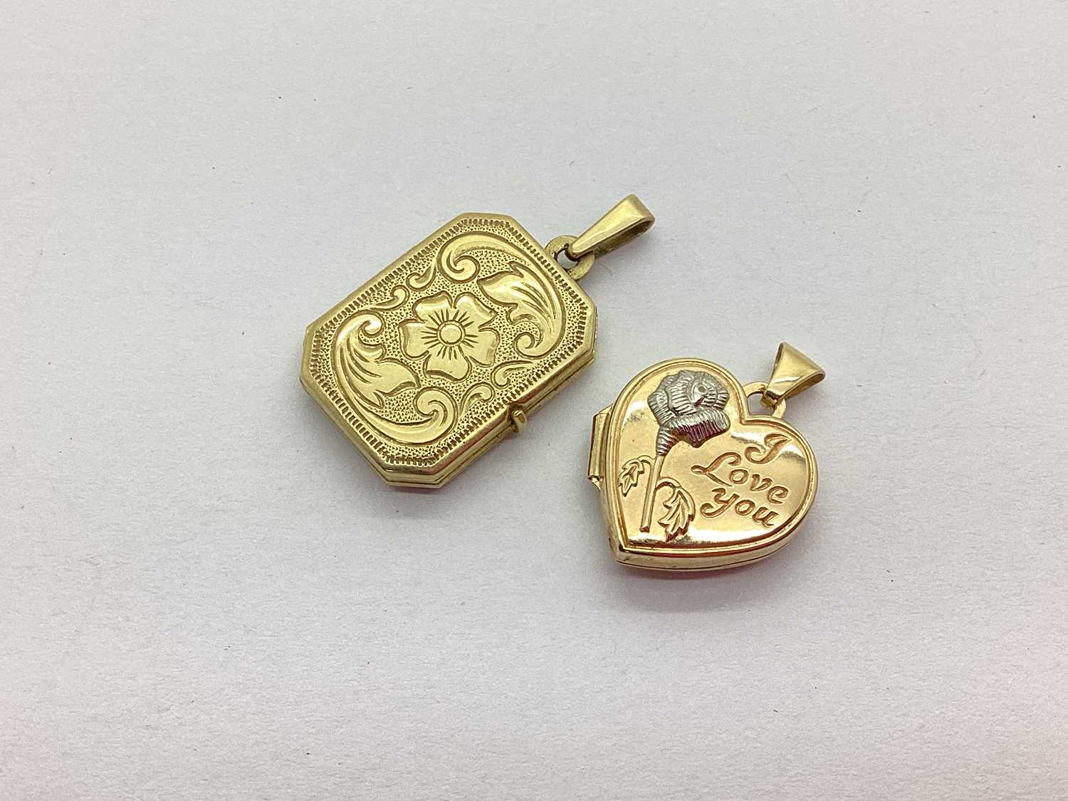 Lot 216 - A 9ct Gold Heart-Shape Locket Pendant, "I