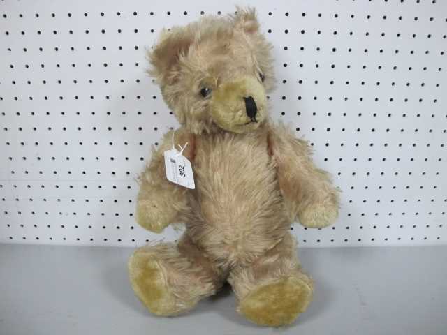 Lot 302 - A Mid 20th Century Well Loved Jointed Teddy