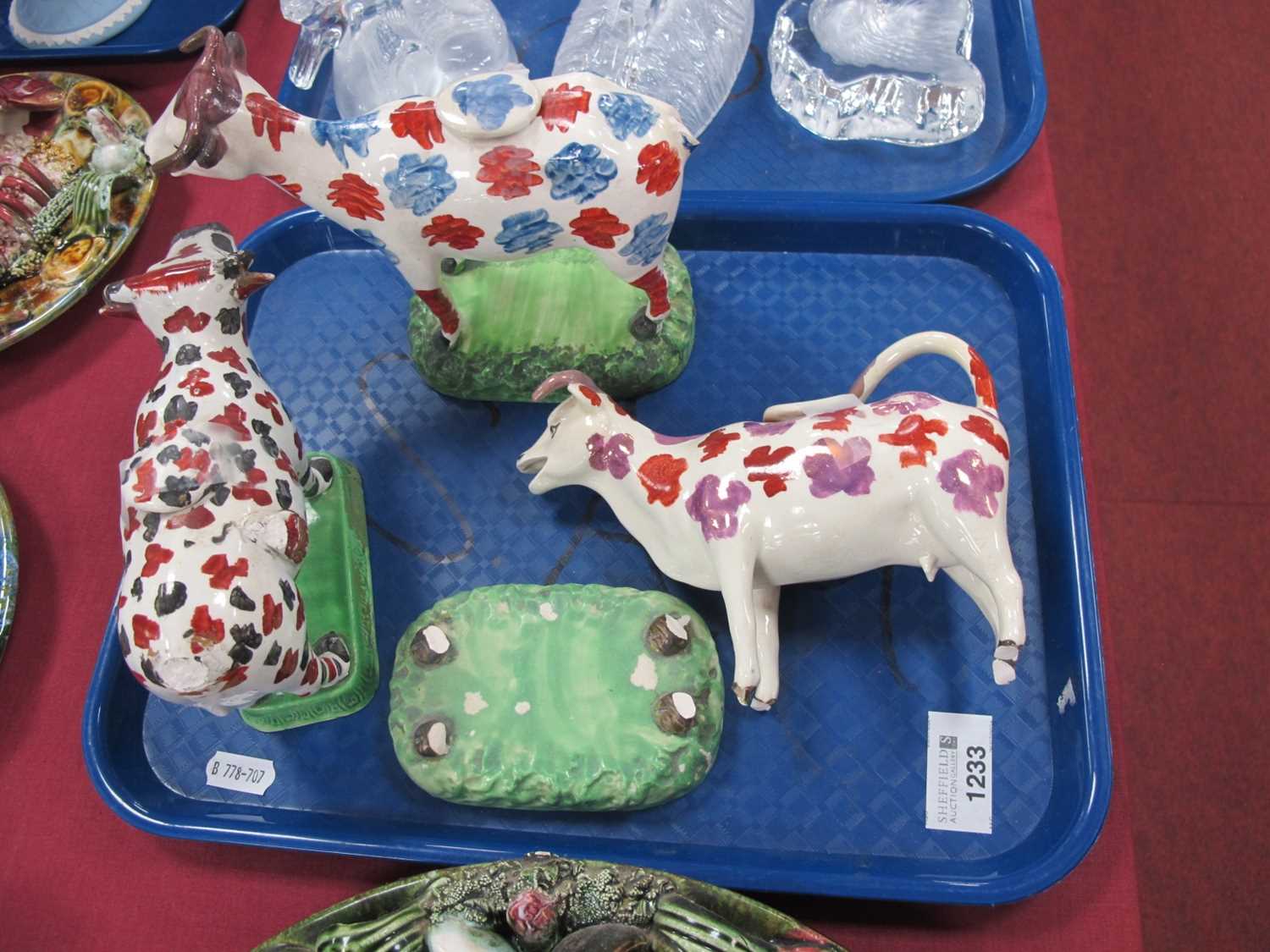 Lot 1233 - XIX Century Cream Ware Cow Creamers, with