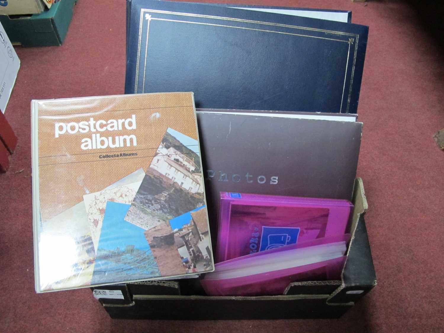 Lot 1149 - Seaside/ saucy postcards in two albums both