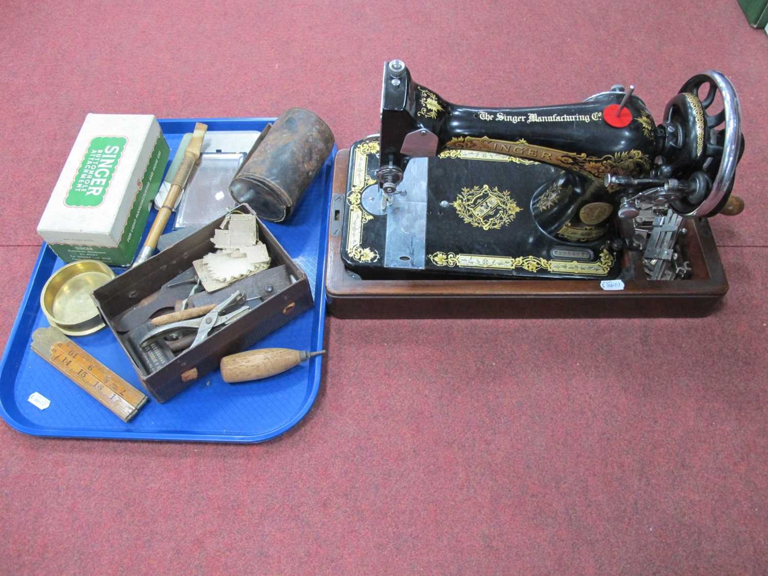 Lot 1495 - A Victorian Singer Sewing Machine, together