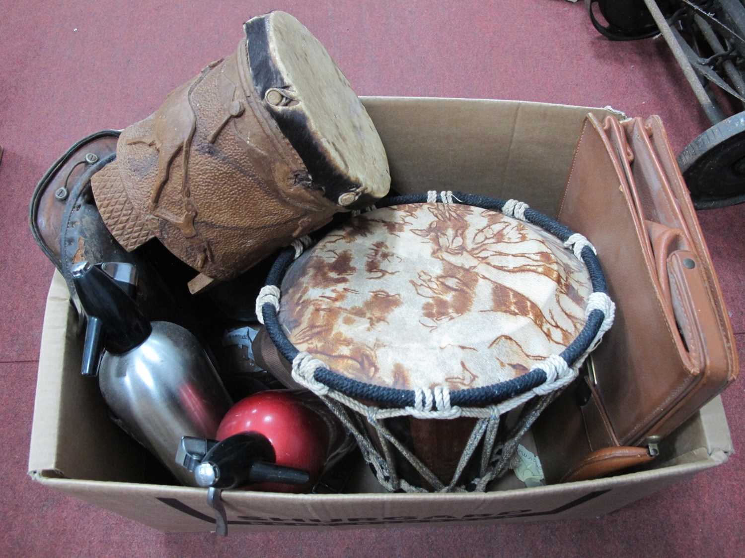 Lot 1152 - Leather Saddle, bongo drums, brief case,