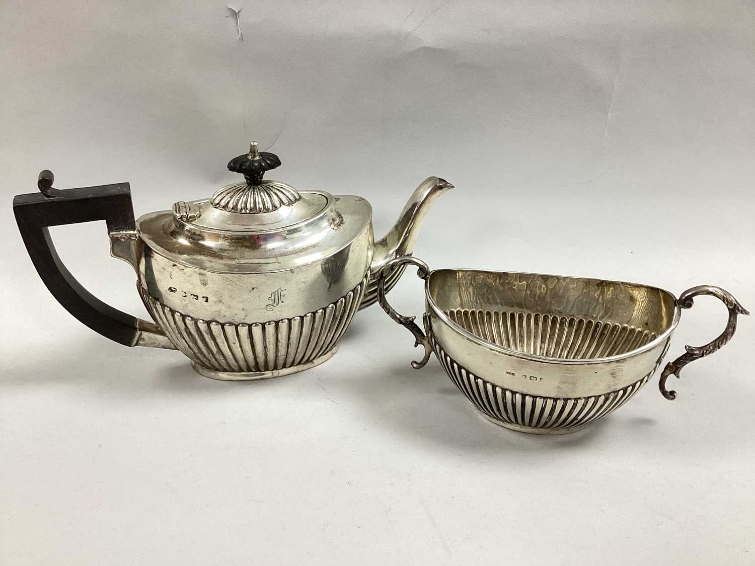 Lot 24 - A Hallmarked Silver Tea Pot, (marks rubbed),