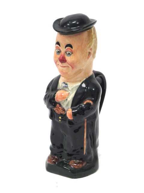 Lot 1056 - A Royal Doulton Pottery Toby Jug and Cover,