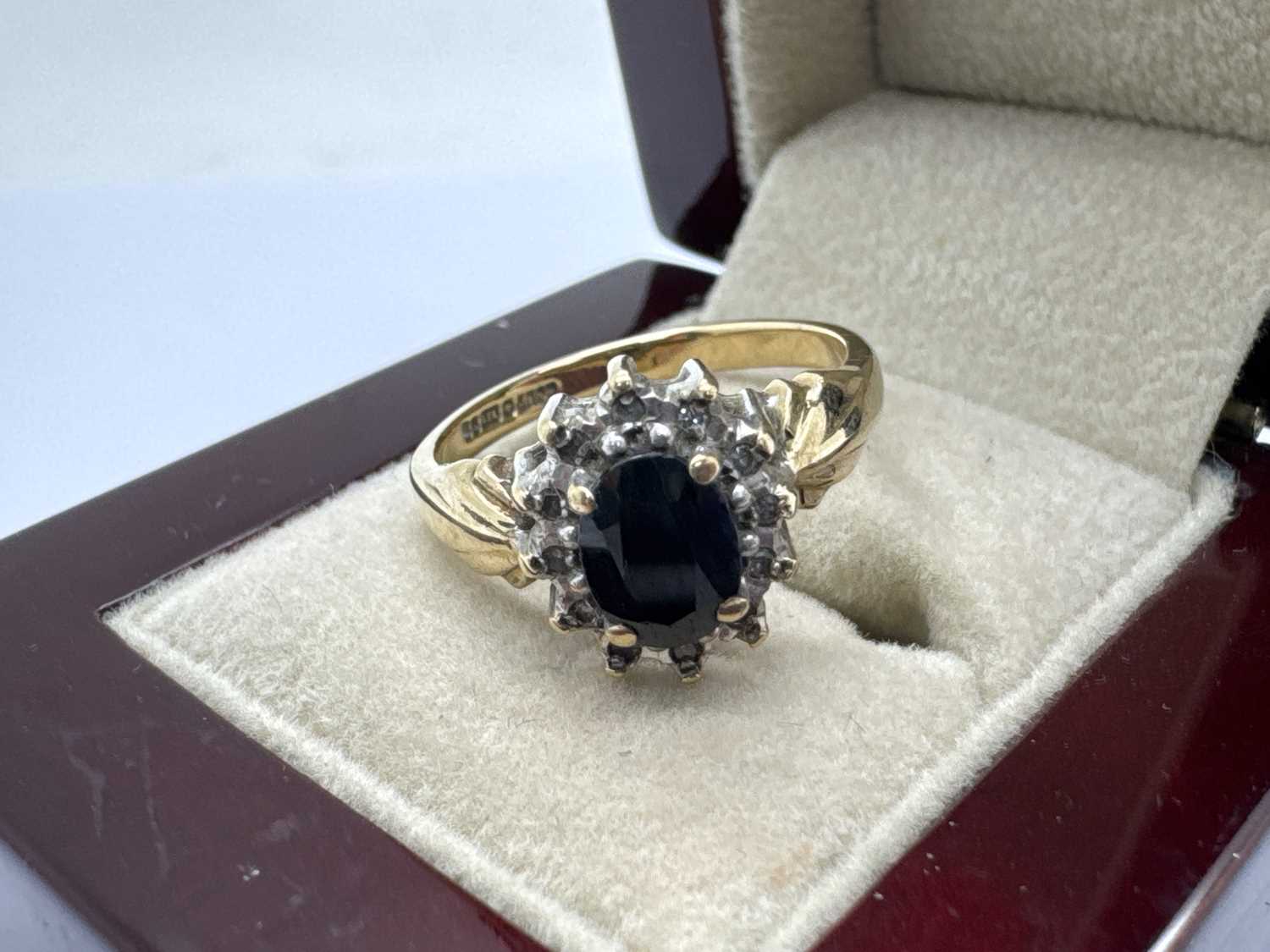 Lot 126 - A 9ct Gold Stone Set Cluster Ring, of