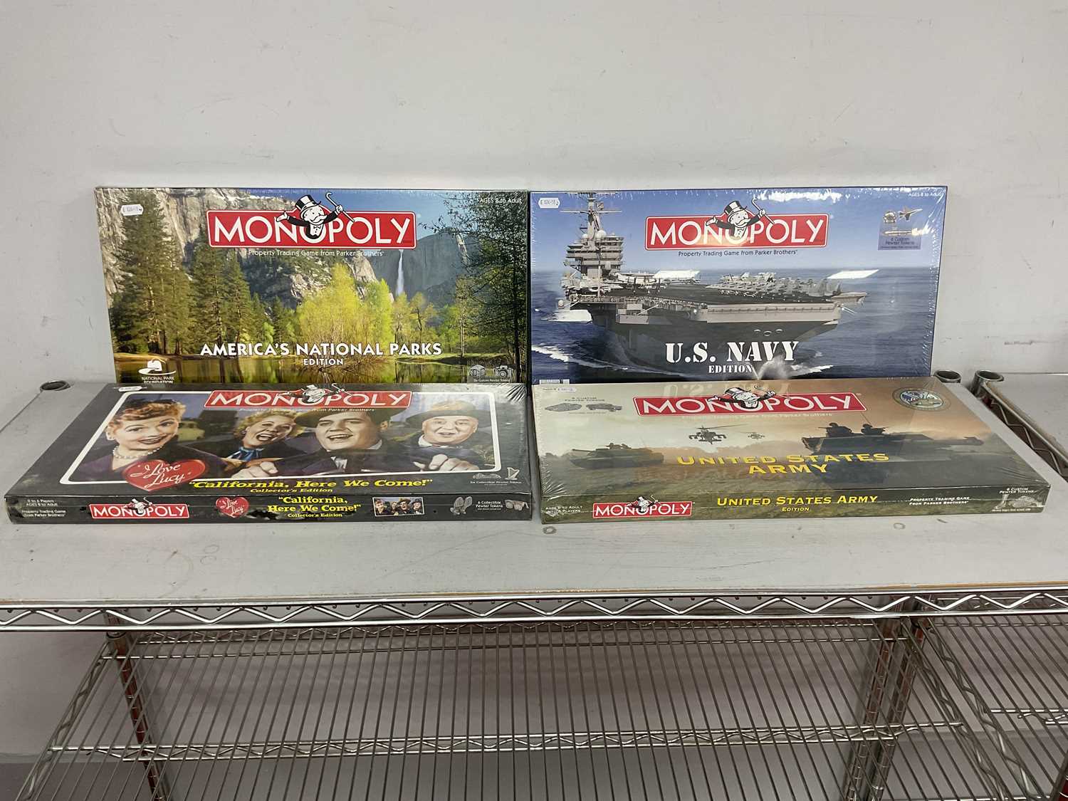 Lot 615 - Four Monopoly Property Trading Games by