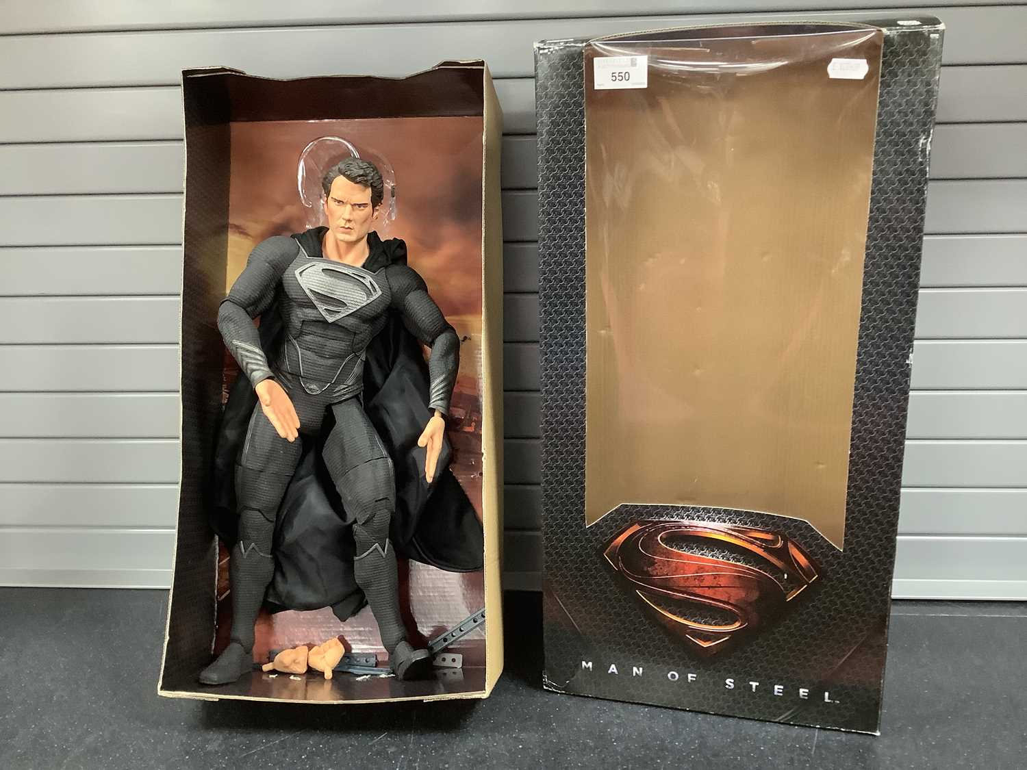 Lot 550 - A Neca DC Comics Superman (Black Suit) Man