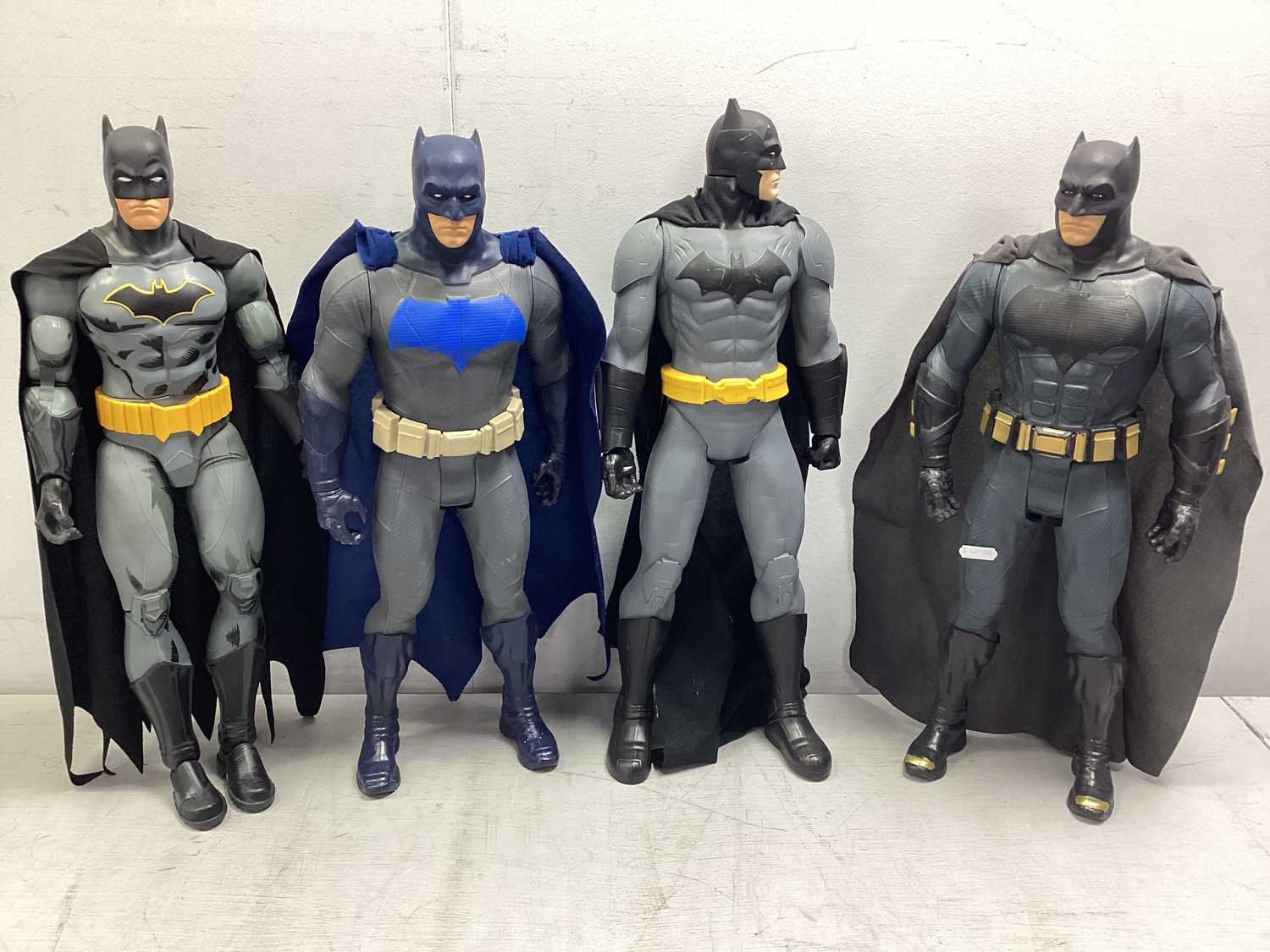 Lot 331 - Four 19" Plastic Batman Action Figures by