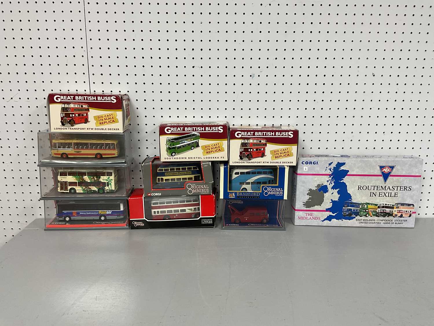 Lot 705 - Fourteen Diecast Model Buses by Corgi, Atlas