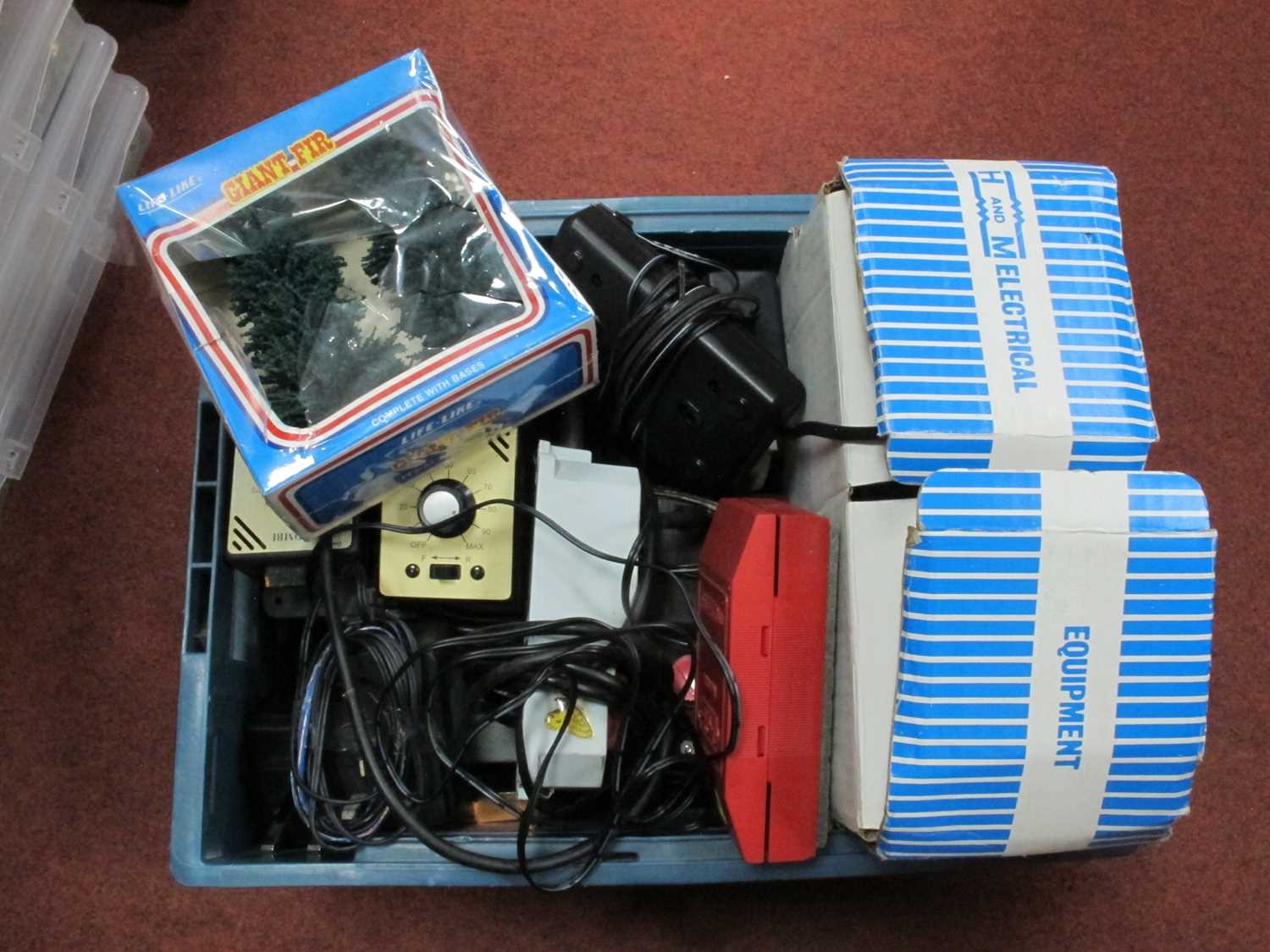 Lot 592 - A box of model railway control equipment