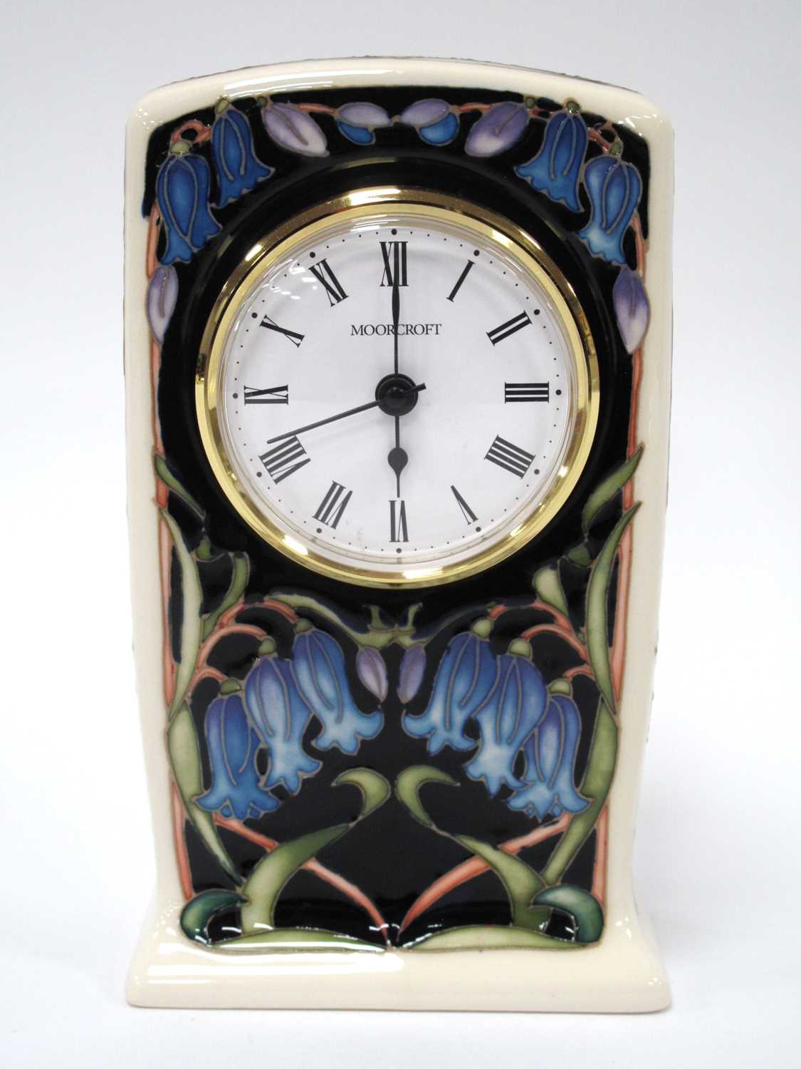 Lot 1162 - A Moorcroft Pottery Clock, painted in the