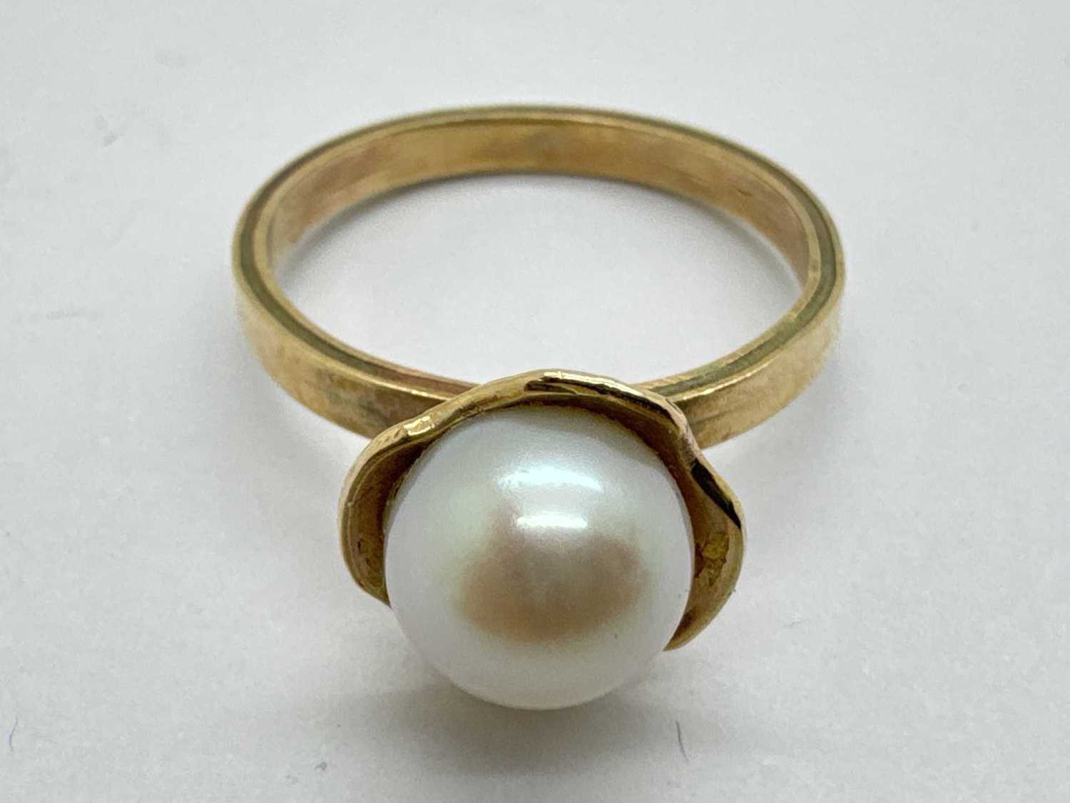Lot 86 - A Freshwater Pearl Bead Inset Dress Ring,