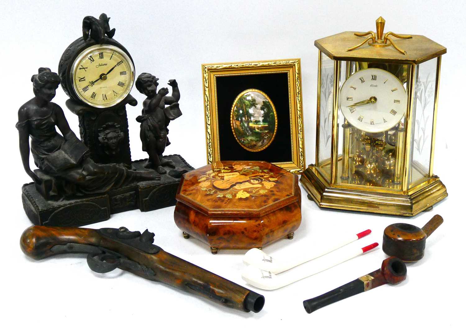 Lot 1351 - Kundo and Juliana Clocks, an inlaid musical