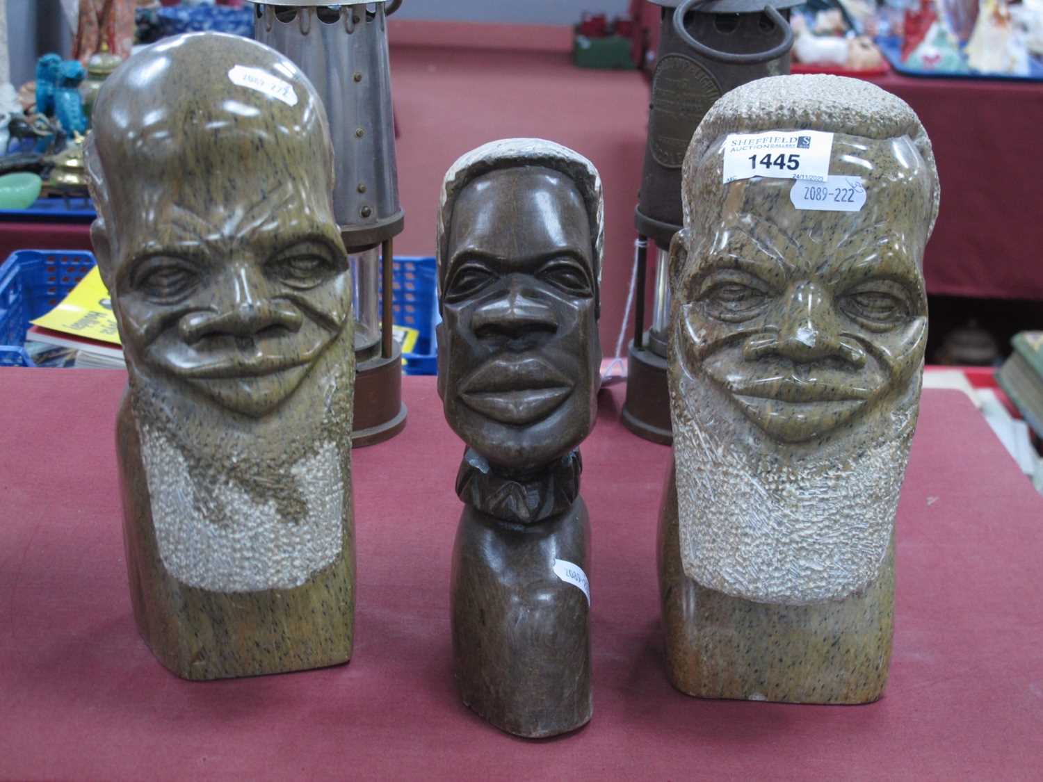 Lot 1445 - Carved Stone Busts of African Men with
