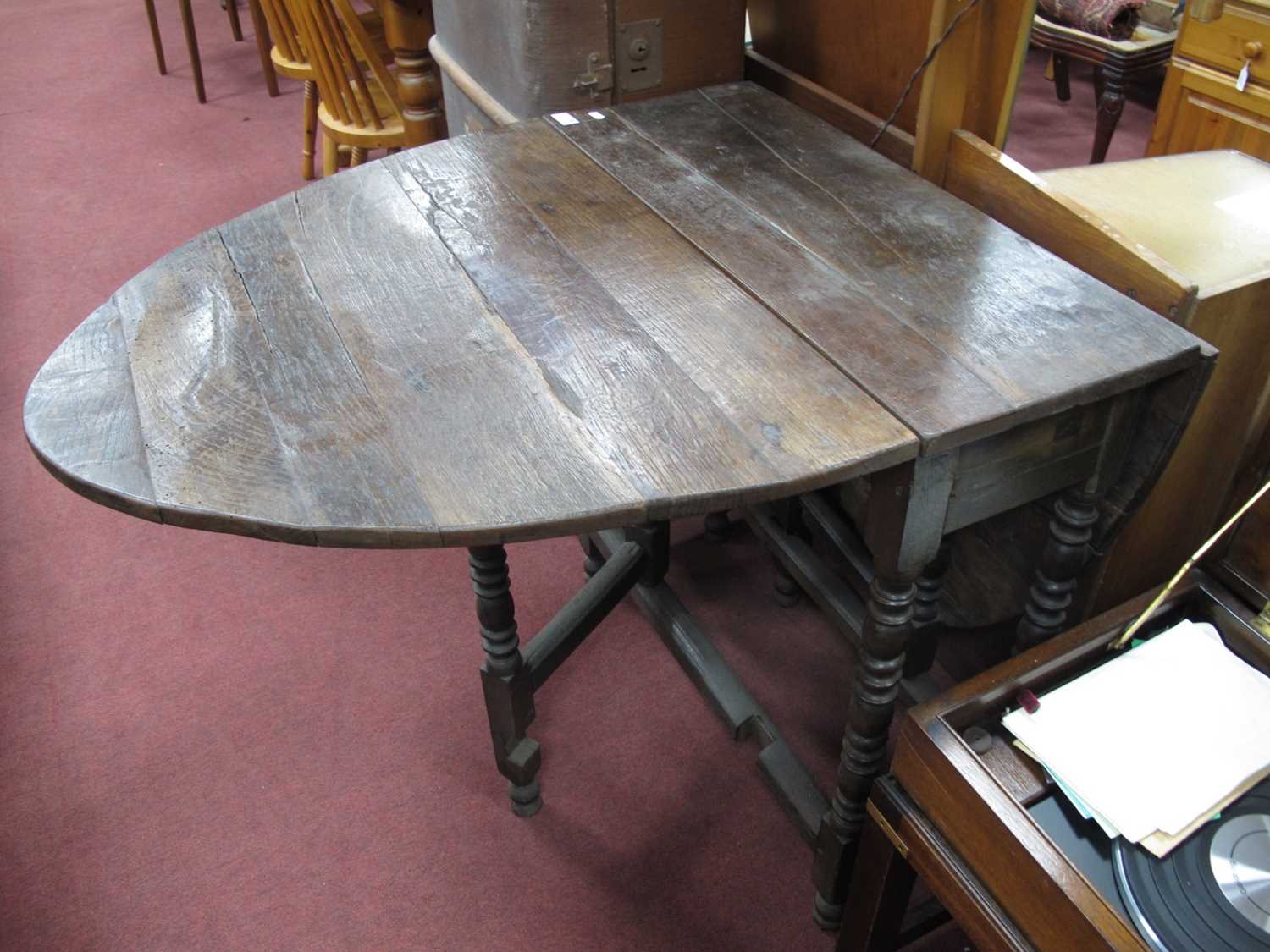 Lot 1572 - XVIII Century Oak Gate-Leg Table, with drop