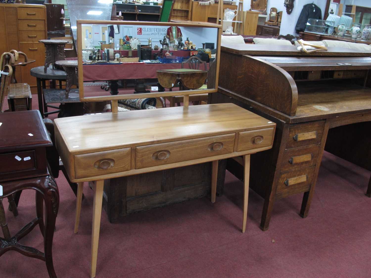 Lot 1605 - Ercol Dressing Table, with a raised mirror,