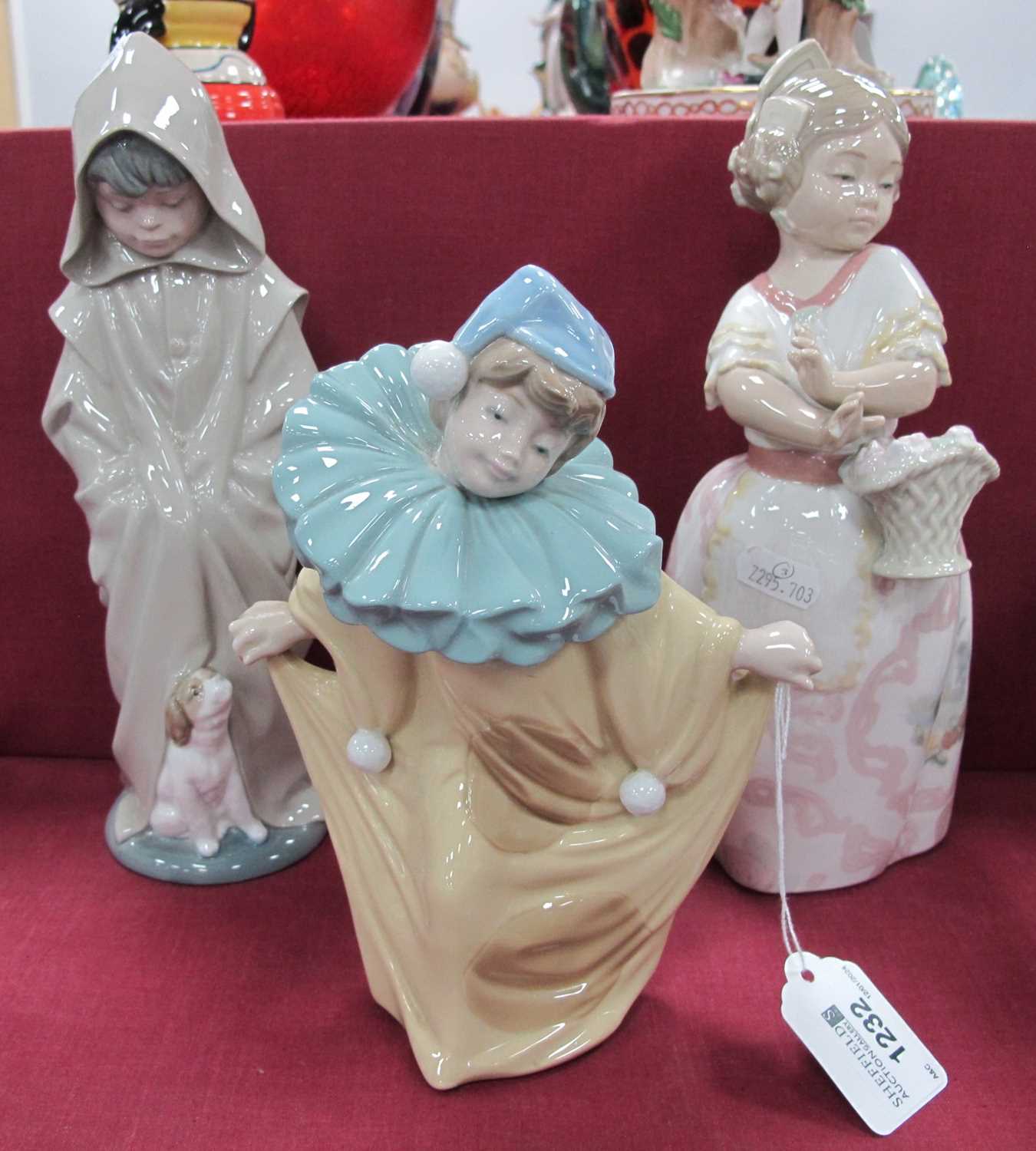 Lot 1232 - Nao Pierrot Boy, 19.5cm high, girl (finger
