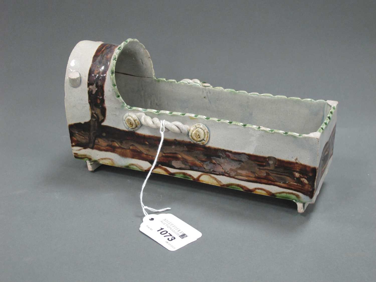 Lot 1073 - A Pottery Crib, circa XVII/XVIII Century,