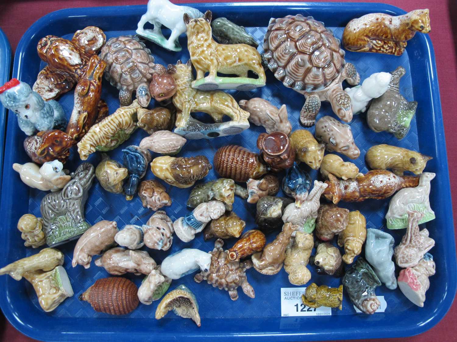Lot 1227 - A Large Collection of Wade Whimsies, etc:-